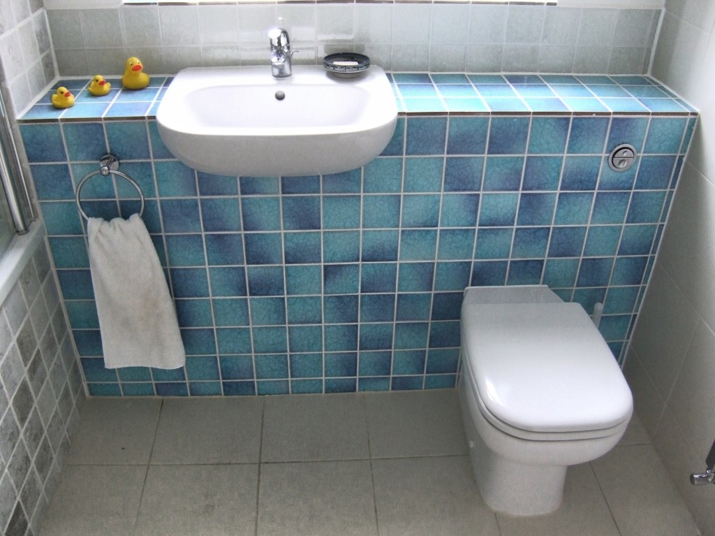 Semi recessed basin and back to wall WC set in bespoke boxing ...